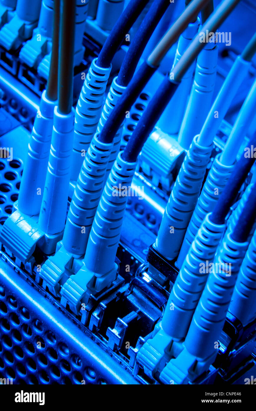 optic fiber cables connected to hub Stock Photo - Alamy