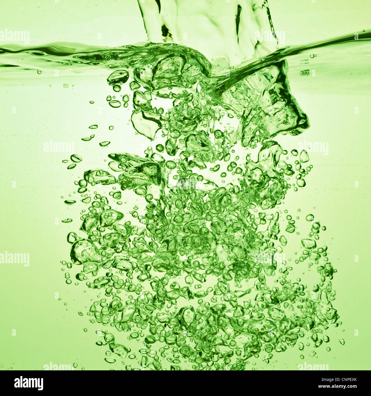 green soda drink with bubbles Stock Photo - Alamy