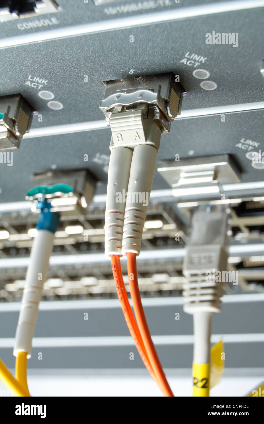 optic fiber cables connected to data center Stock Photo - Alamy