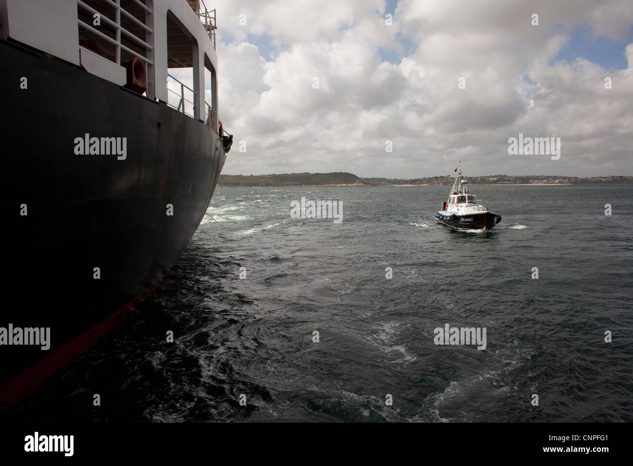 The Arrow, a secondary pilot boat approaches alongside the Romandie ...