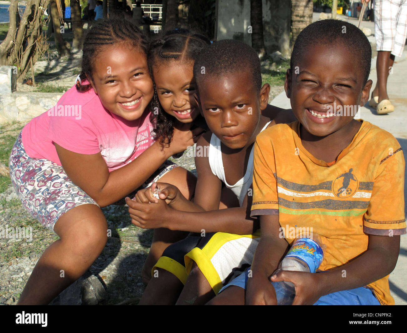 Happy children in Roatan, Honduras Stock Photo - Alamy