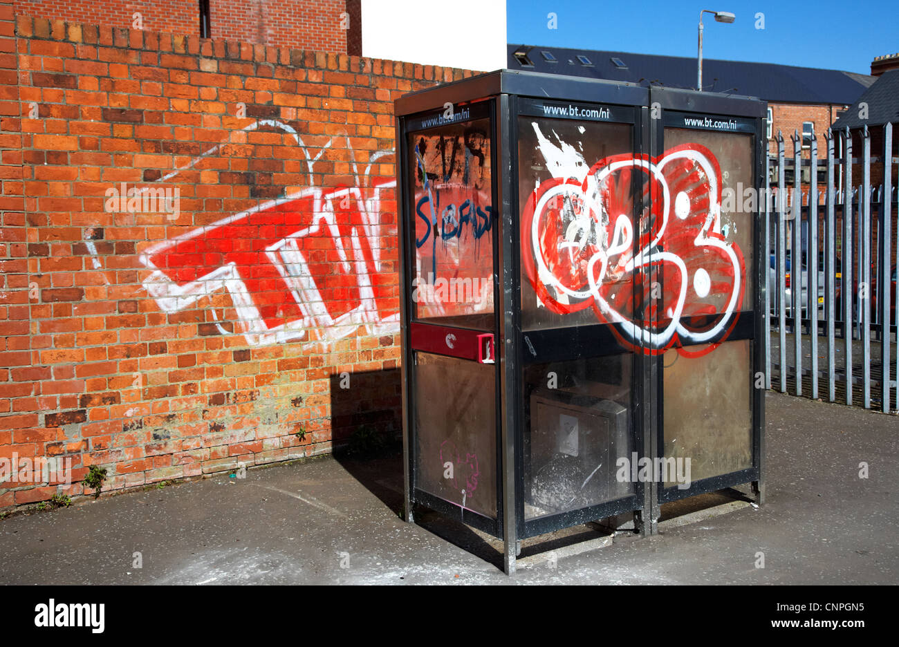 tag graffiti covered british telecom telephone boxes in Belfast ...