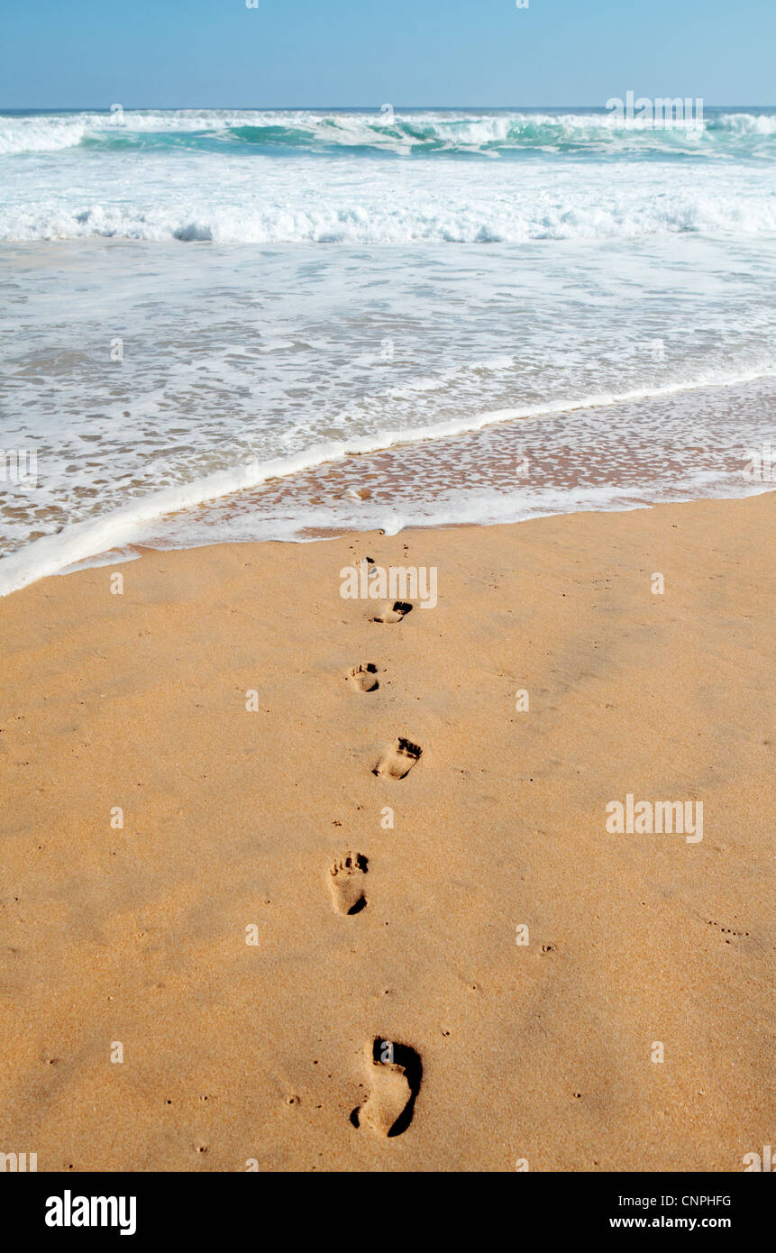 Footsteps into Sea Stock Photo - Alamy