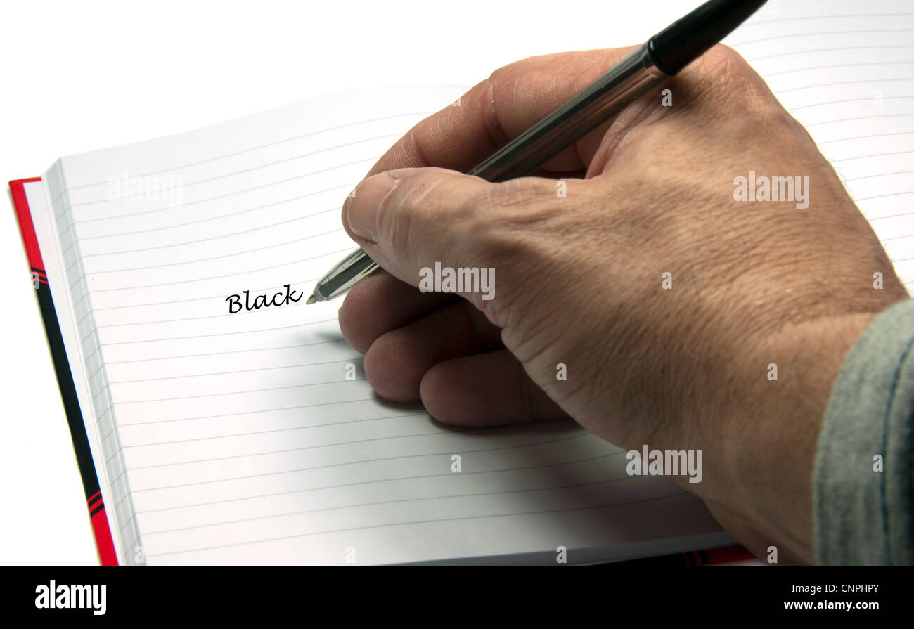 hand with pen writing black Stock Photo - Alamy