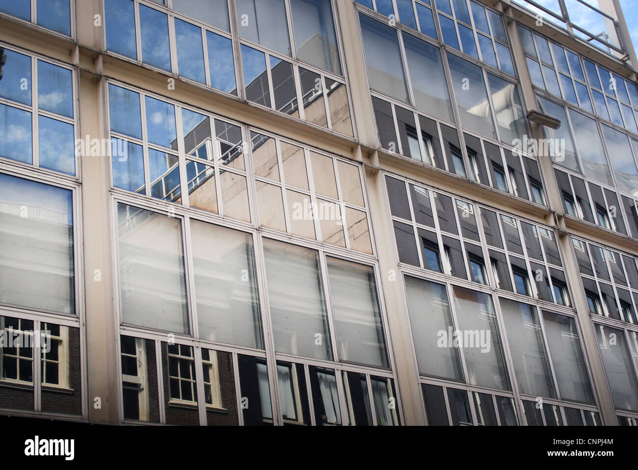 Dull office block windows Stock Photo - Alamy