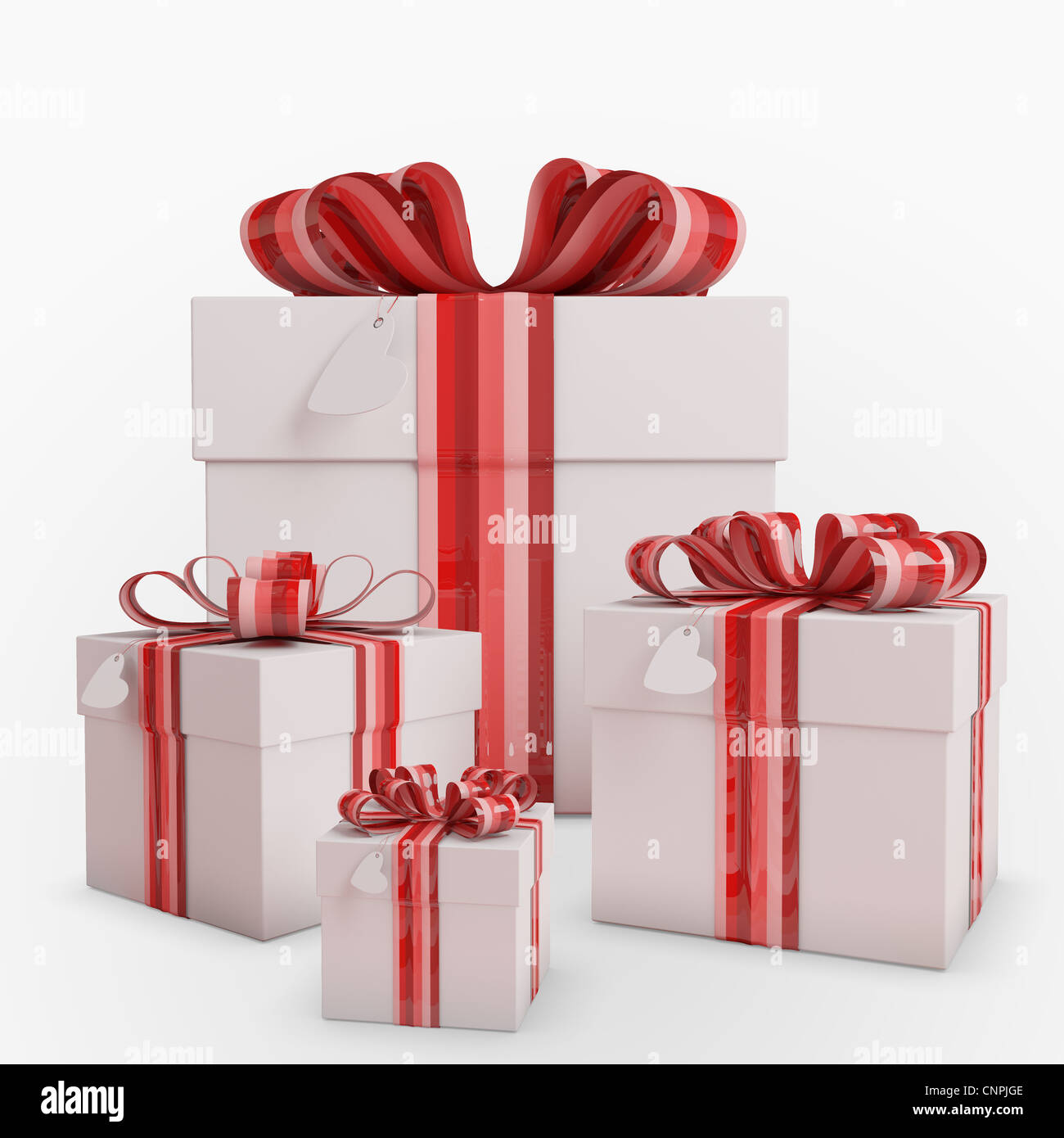 Four gifts boxes with Bow & heart tag Stock Photo - Alamy