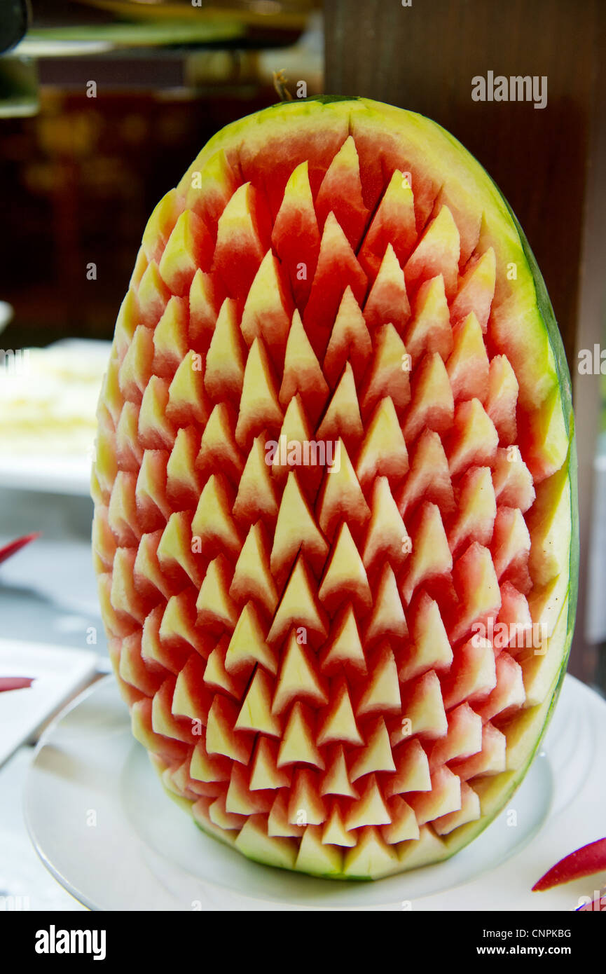 beautiful artful carved melon for decoration at the buffet Stock Photo ...