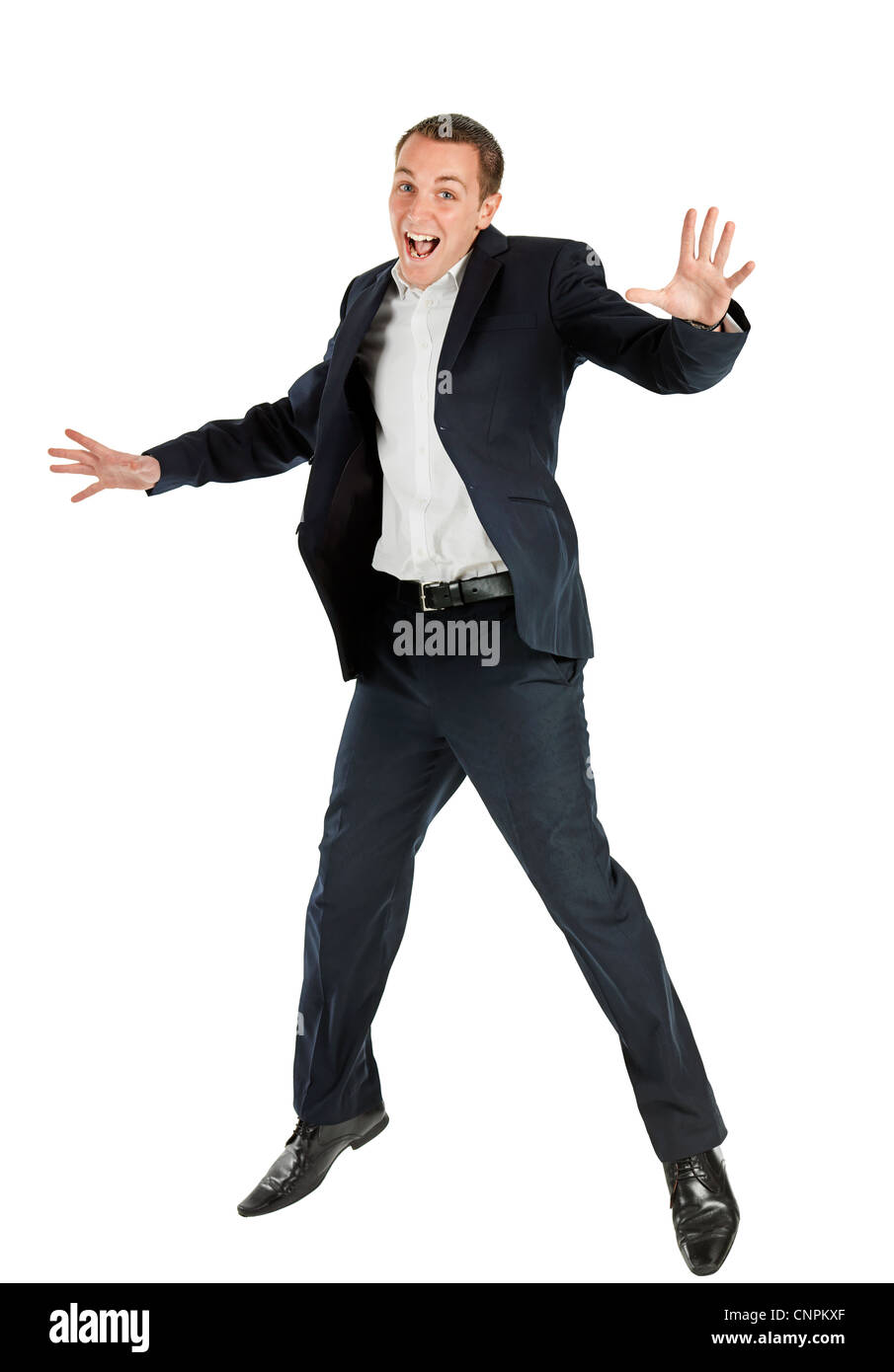 Happy jumping young businessman Stock Photo - Alamy