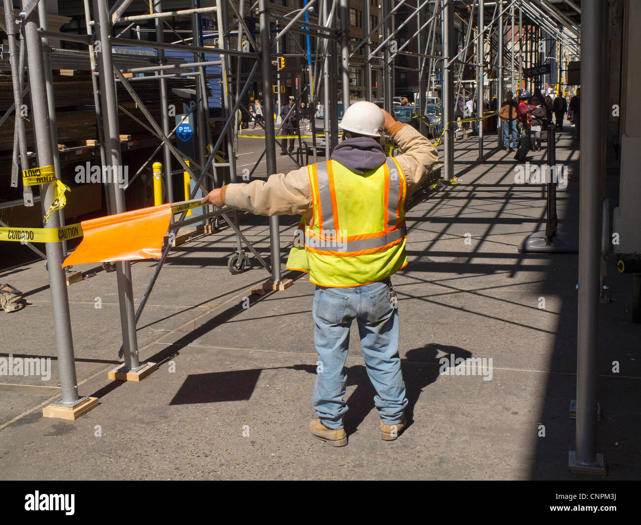 construction workers on scaffolding on an apartment building in ...