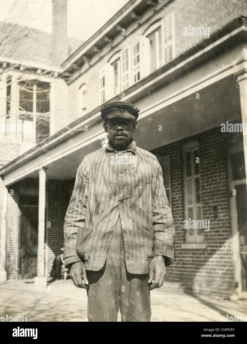 Circa 1930s photograph, an African-American man working in a rich ...