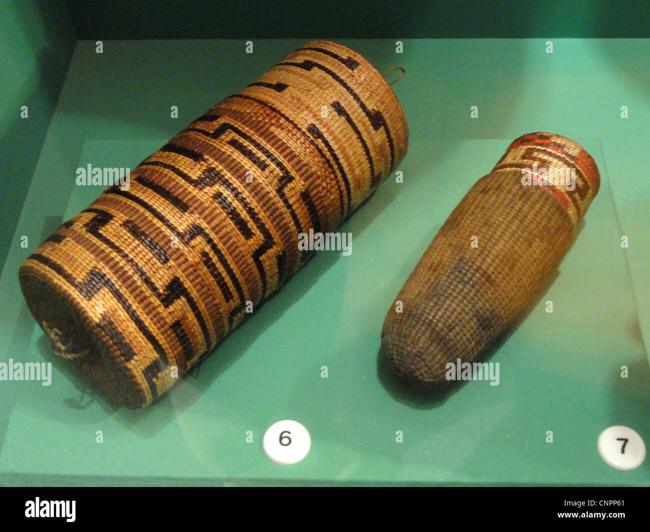 The double baskets, crafted by the Tlingit people, date from the late ...