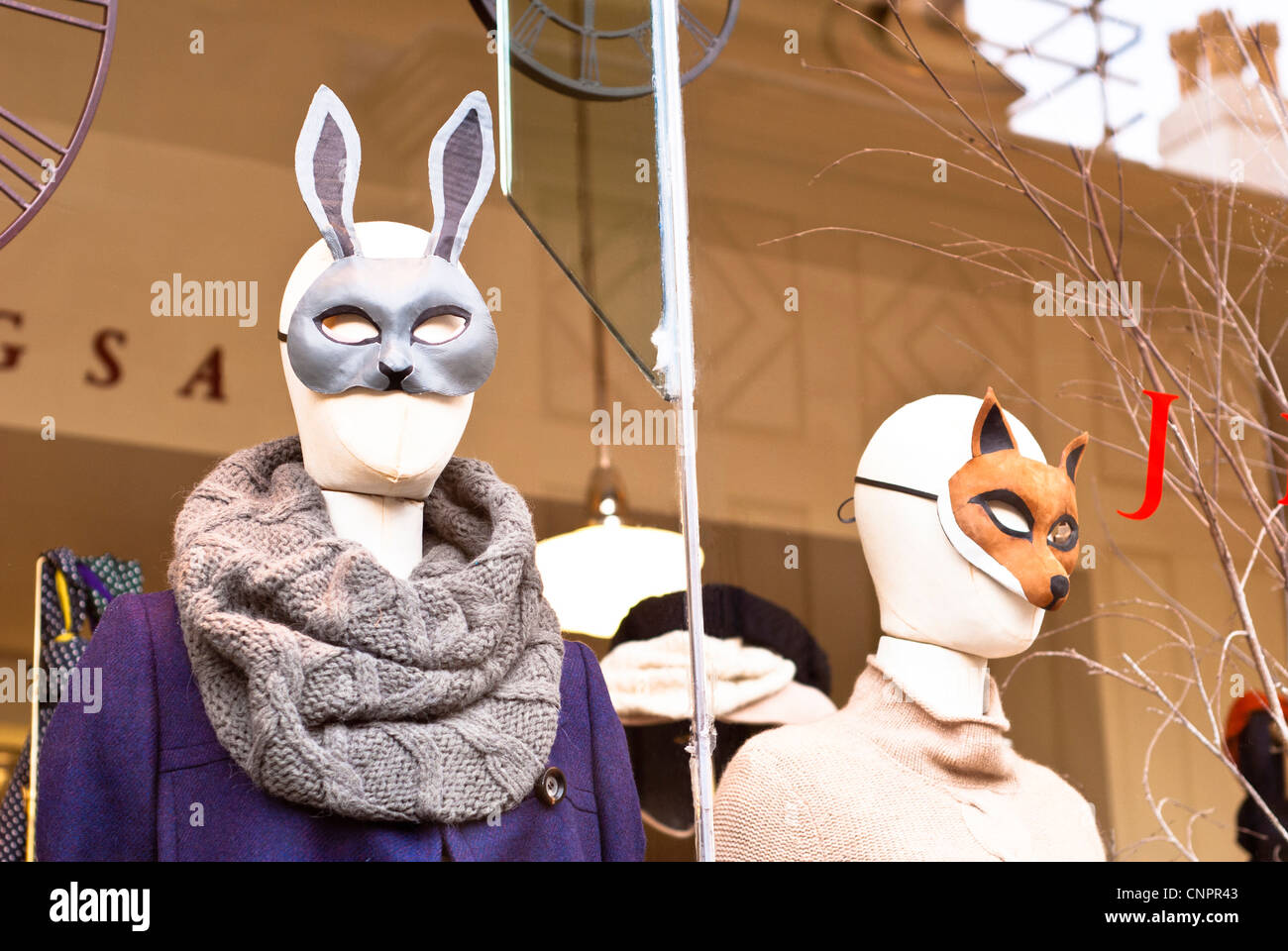 A clothing shop window display in winter, Manchester, England, UK Stock ...