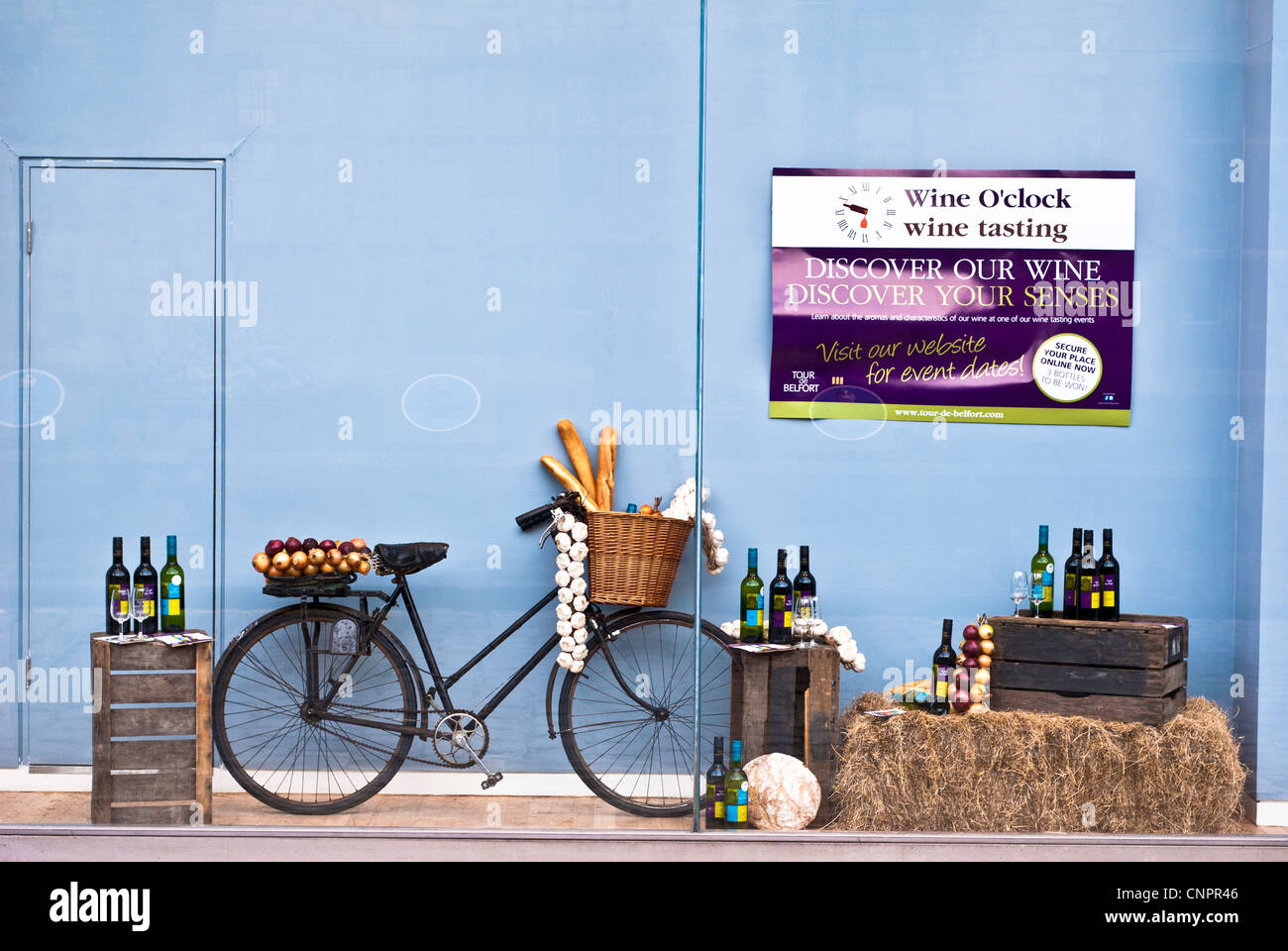 A window display with a French theme incorporated, showing bicycle ...