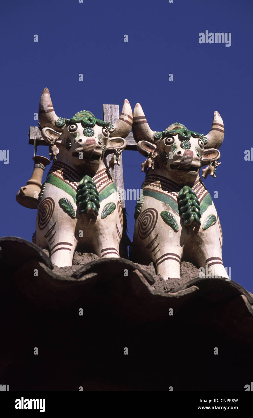 Statues of Bulls, "Torito de Pucara'" are traditionally put on the roof ...