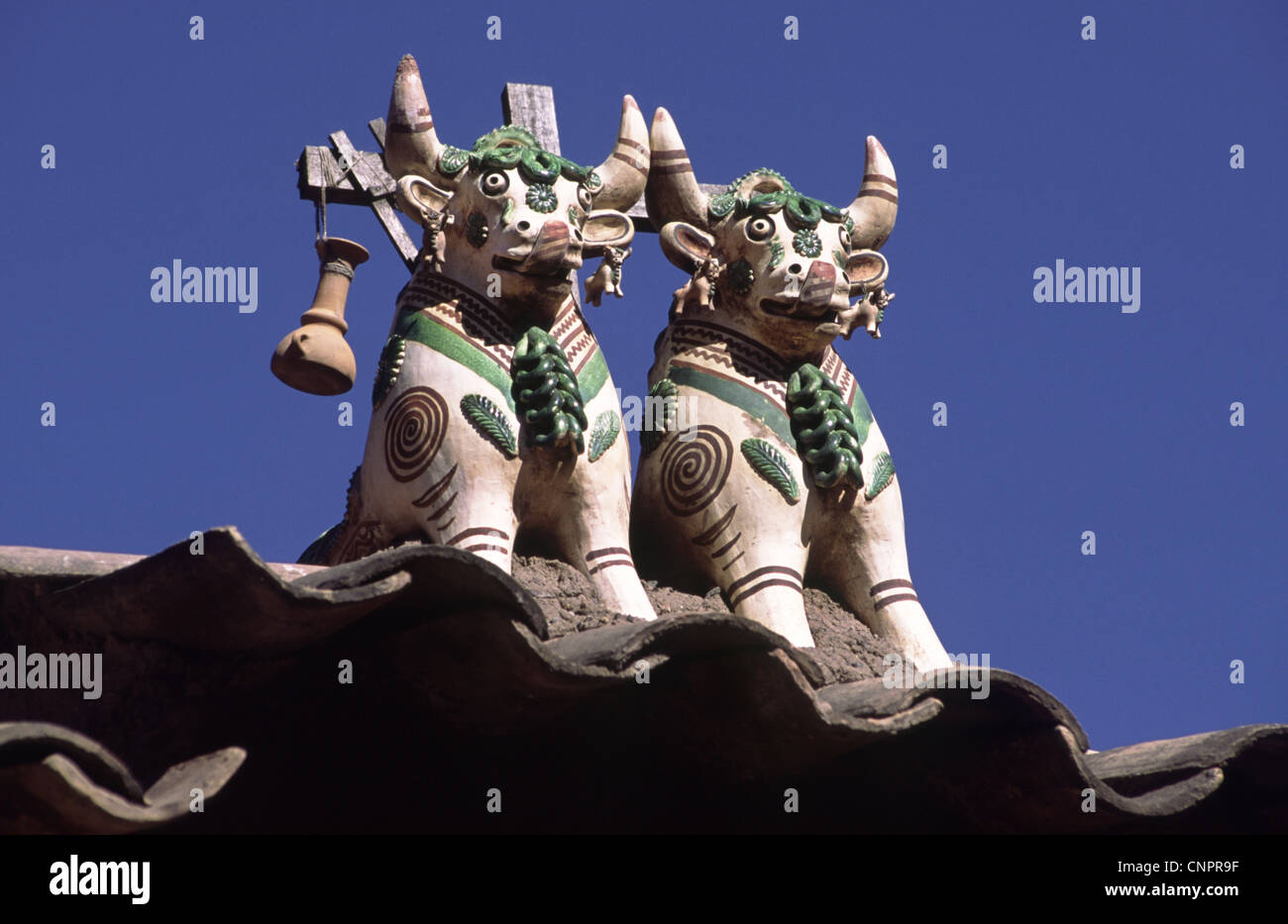 Statues of Bulls, "Torito de Pucara'" are traditionally put on the roof ...