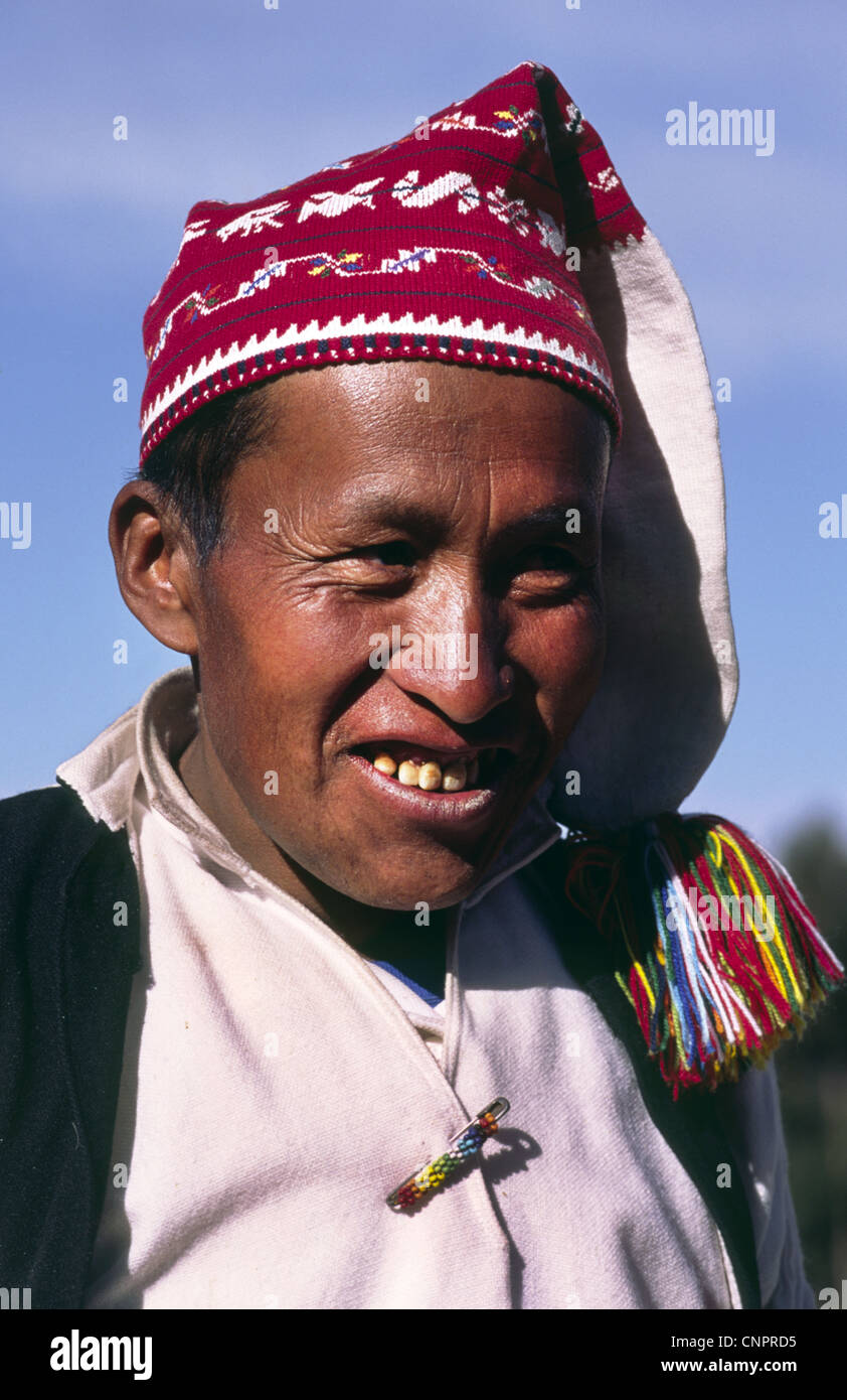 Man with traditional knitted cap on Taquile Island. Lake Titicaca, Peru ...