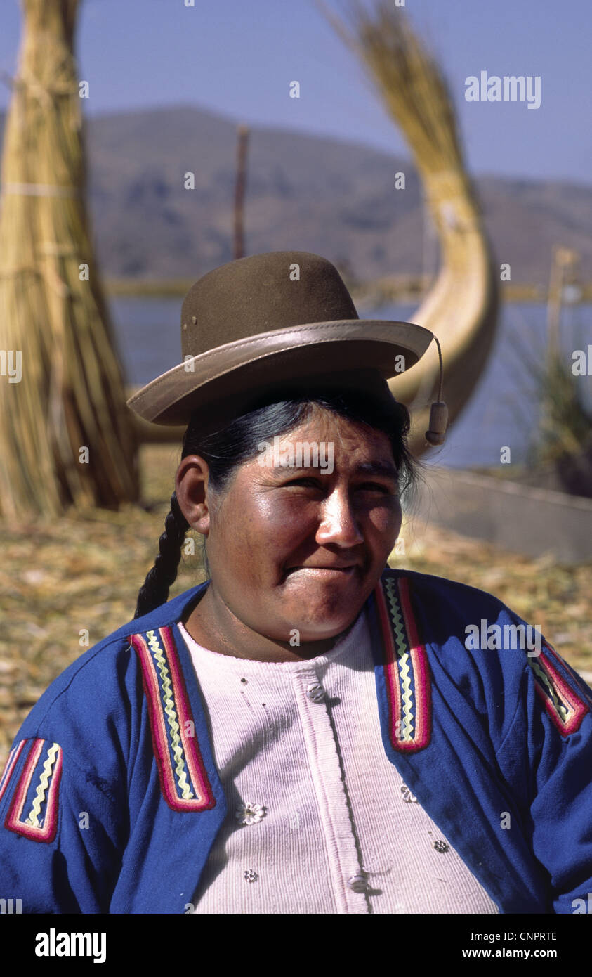 Uros woman on floating reed Island. Lake Titicaca, Peru Stock Photo - Alamy