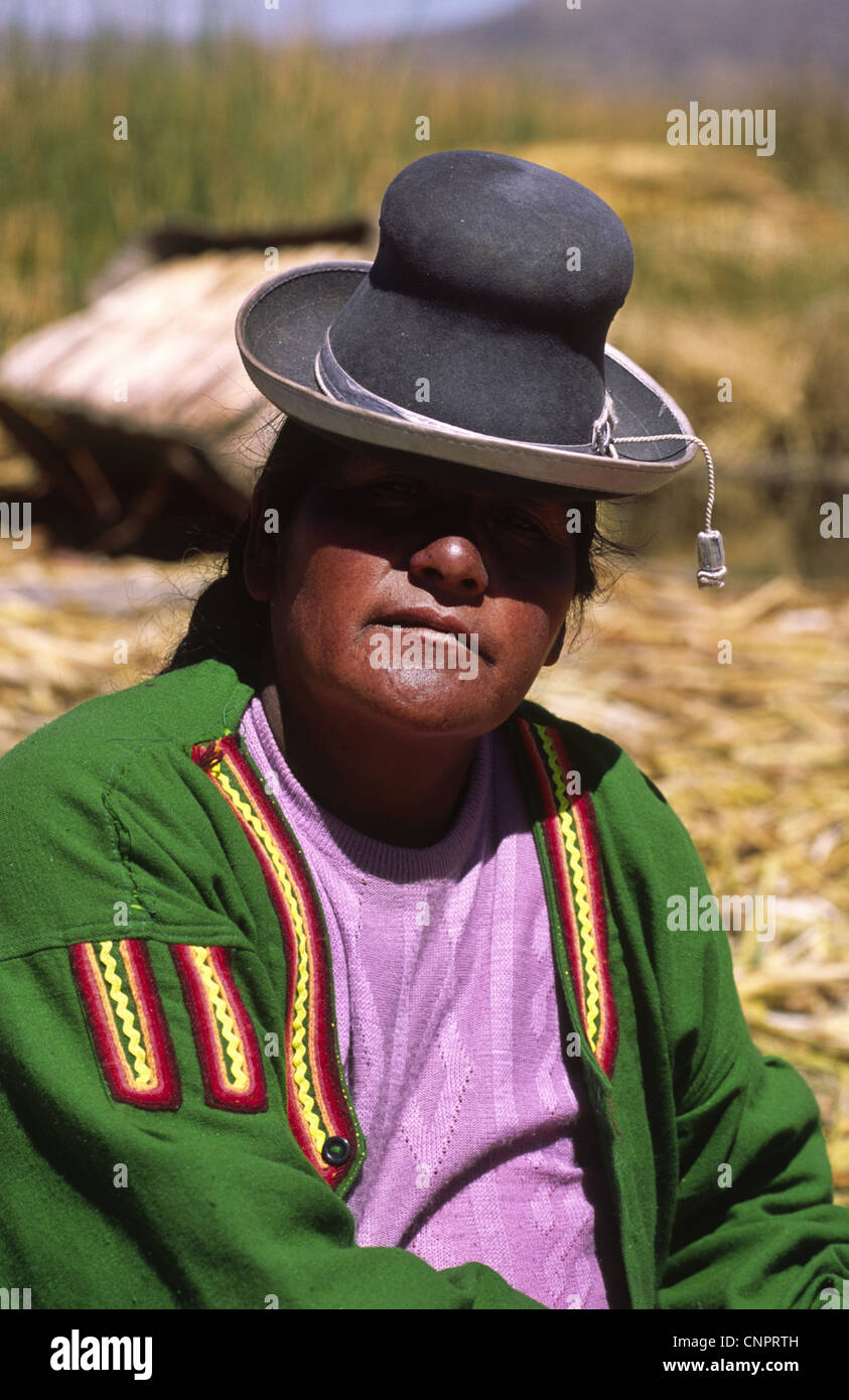 Uros woman on floating reed Island. Lake Titicaca, Peru Stock Photo - Alamy