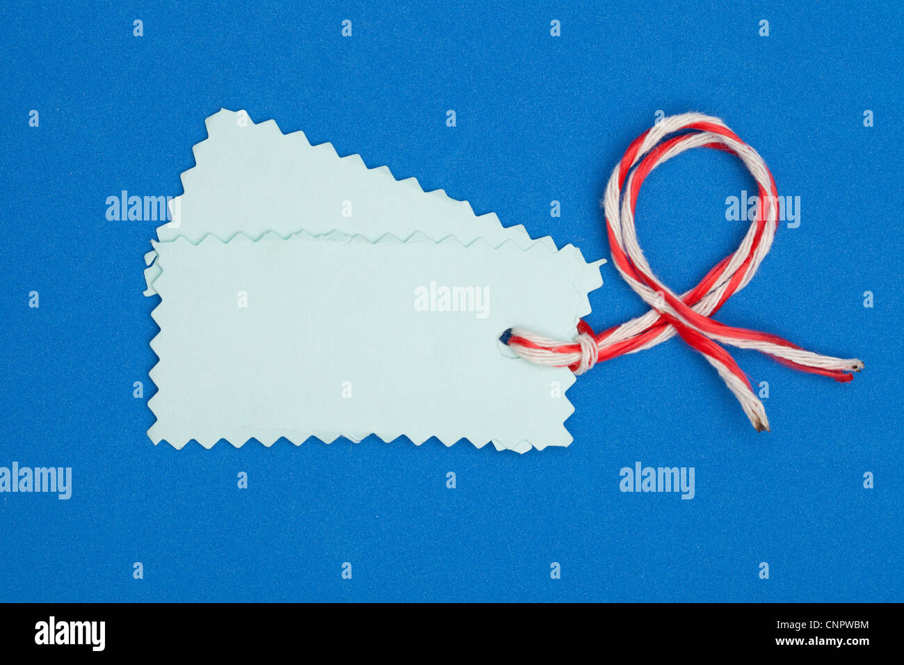 price tag on blue background Stock Photo - Alamy
