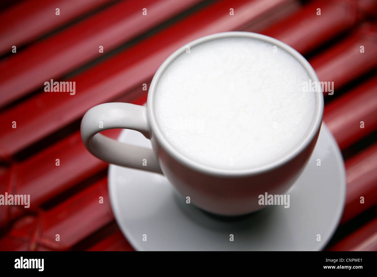 Red table hi-res stock photography and images - Alamy