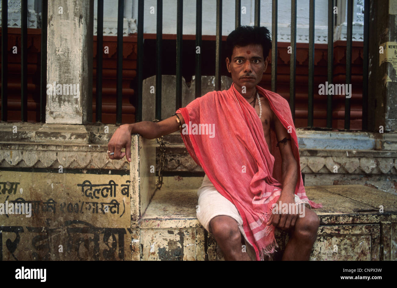 Portrait of an indian man at the ancient Indian city of Benares ...