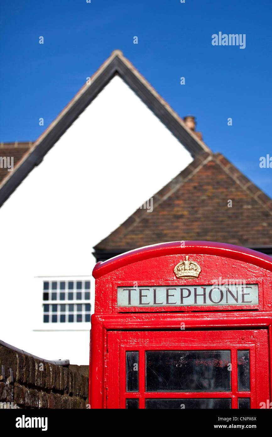 Traditional British Telephone Box or Kiosk with White Gable-end out of ...