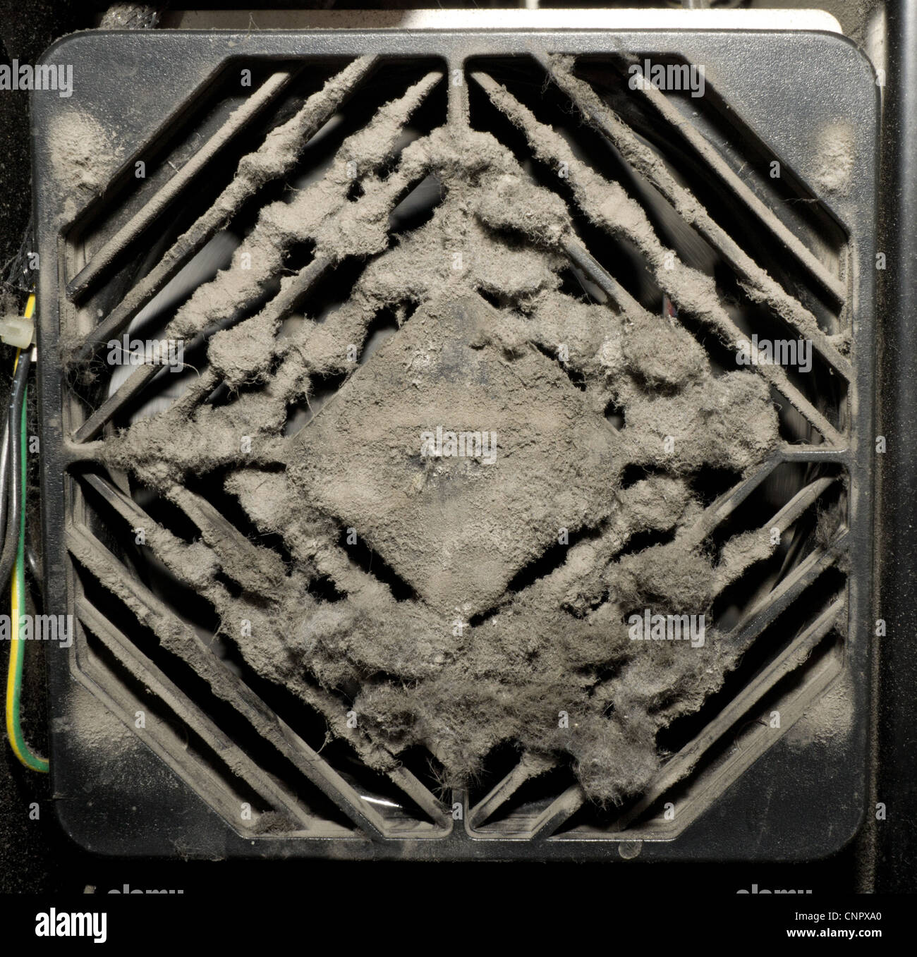 Build up of dust on fan cover Stock Photo - Alamy
