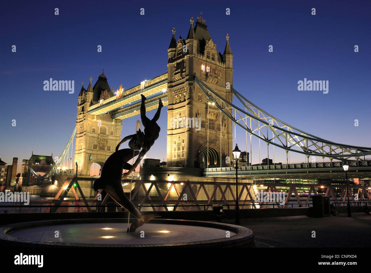 Tower Bridge and Dolphin Statue, London at dusk Stock Photo - Alamy