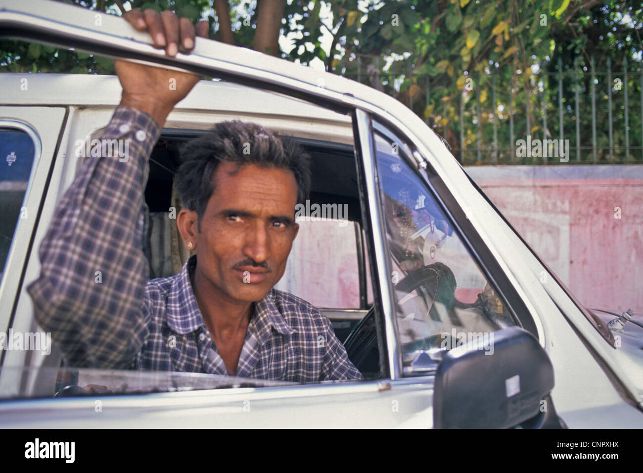 Old man inside taxi cab hi-res stock photography and images - Alamy