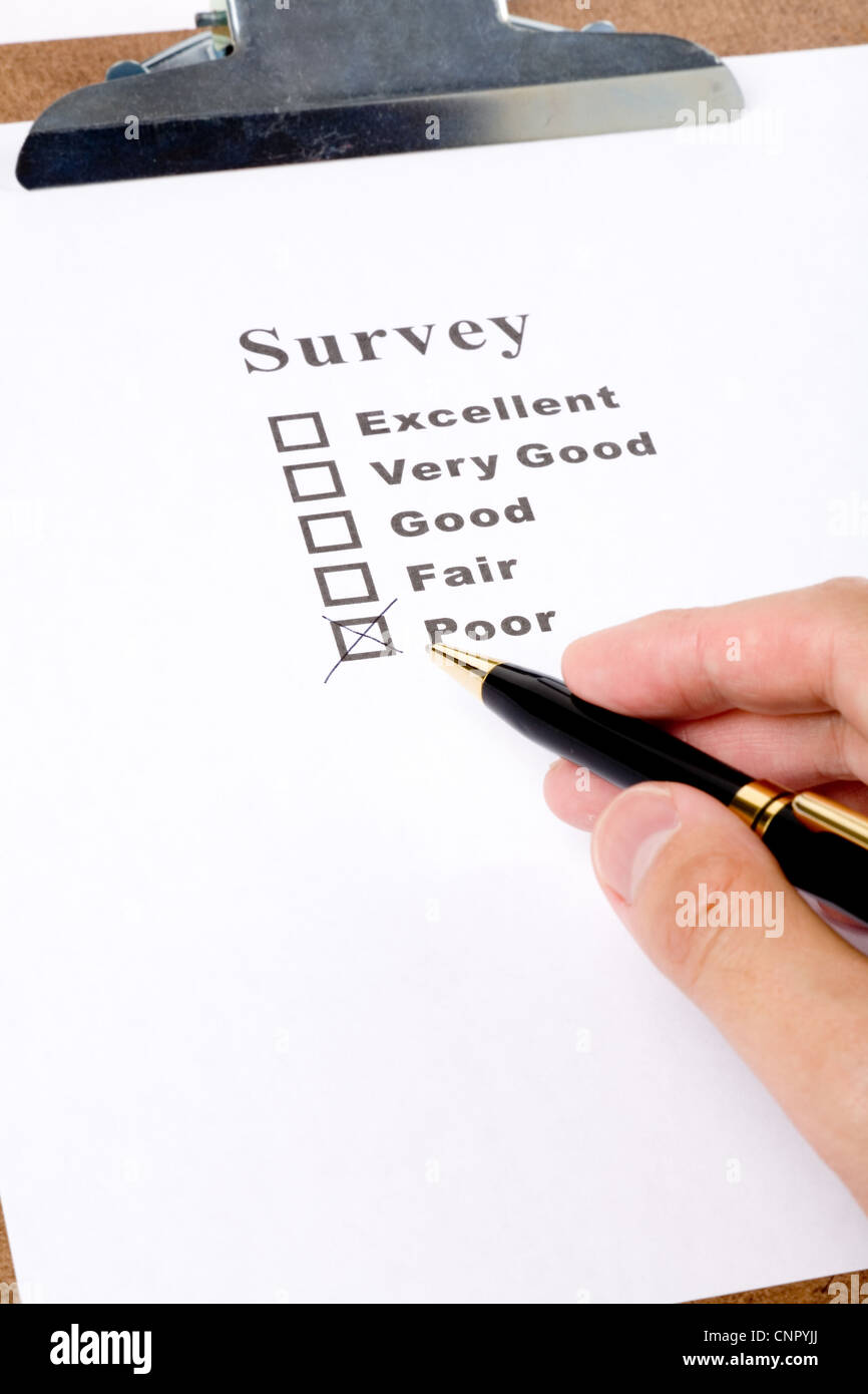 questionnaire and pen, business concept Stock Photo - Alamy