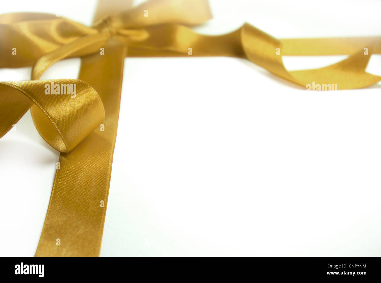 Gold satin ribbon texture hi-res stock photography and images - Alamy