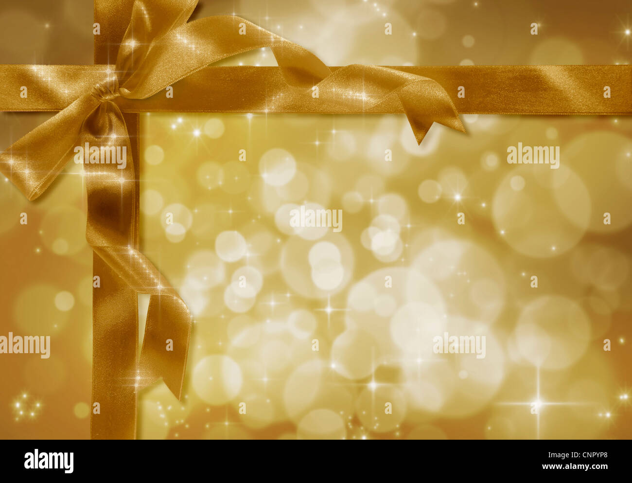 gold gift boxes on abstract gold Christmas background Stock Photo - Alamy