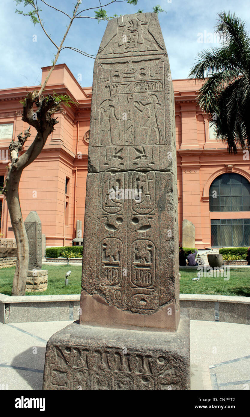 A vertical pillar statue in front of History museum Cairo Egypt Stock ...