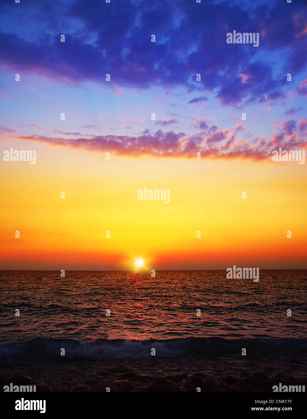 Beautiful sunset on the beach, seascape with calm water Stock Photo - Alamy