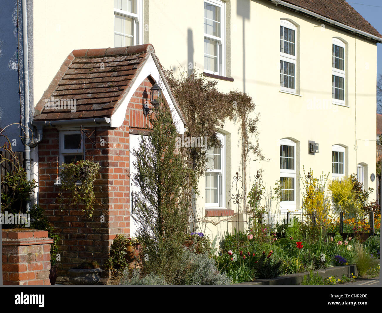 Terraced cottages with a brick porch Stock Photo - Alamy