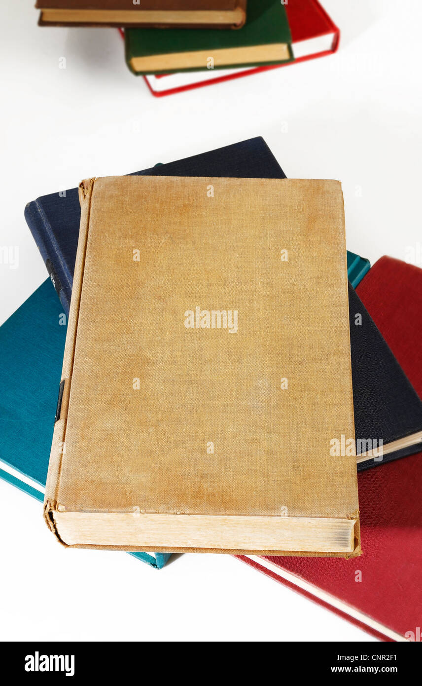 Many old books on white Stock Photo - Alamy