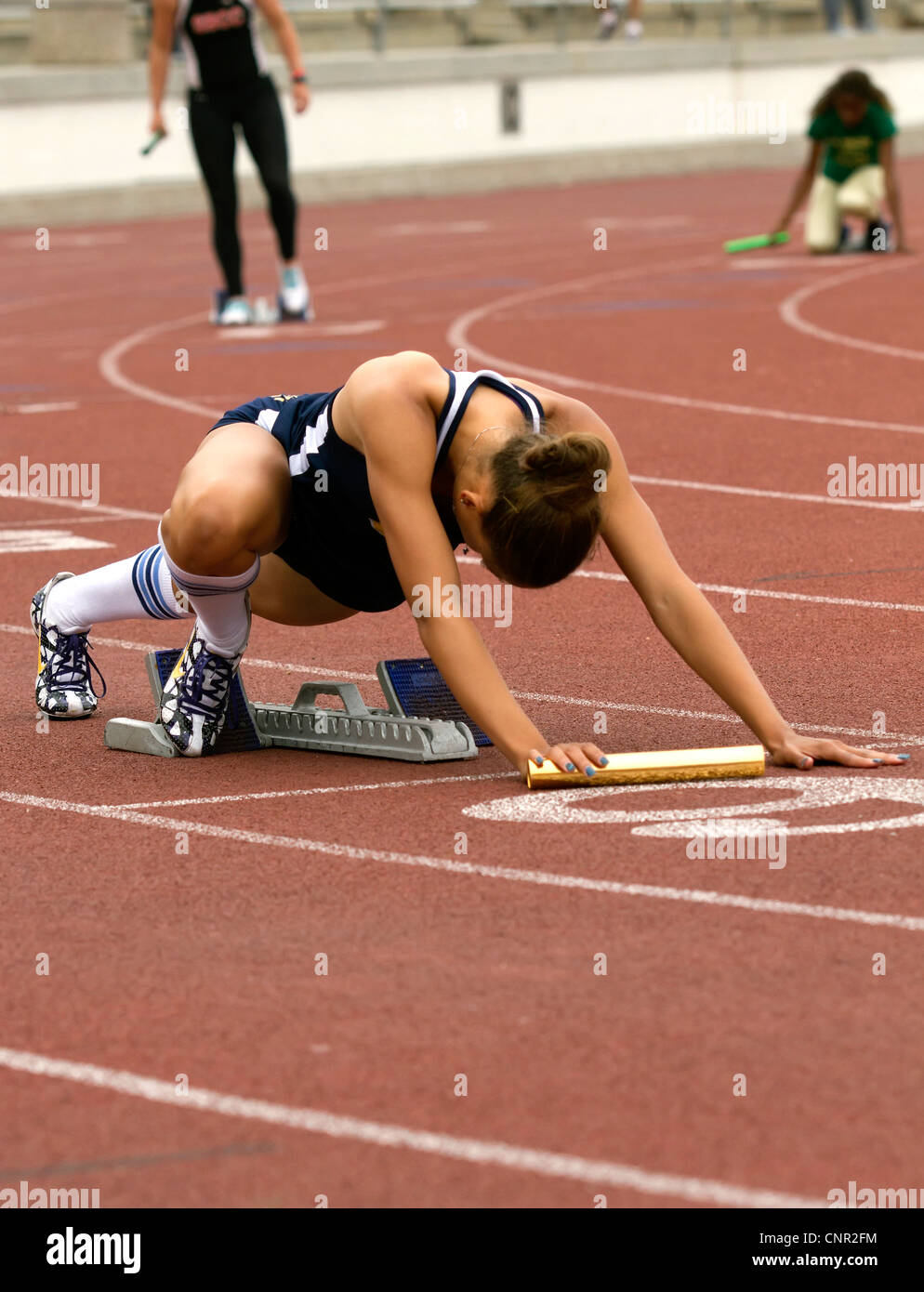 Relay baton hi-res stock photography and images - Alamy