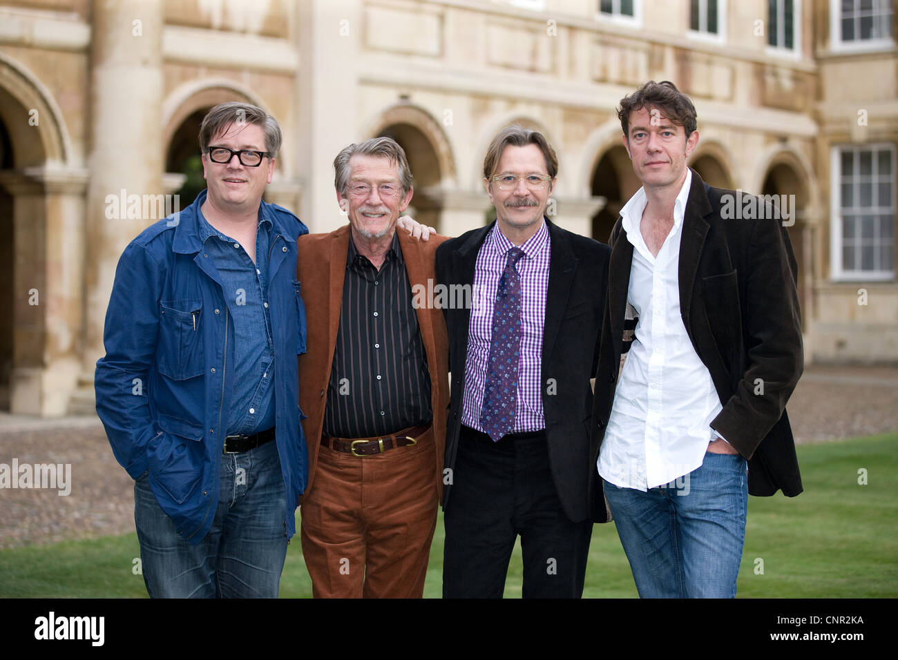 Left to Right Tomas Alfedson,John Hurt,Gary Oldman,Peter Straughan ...