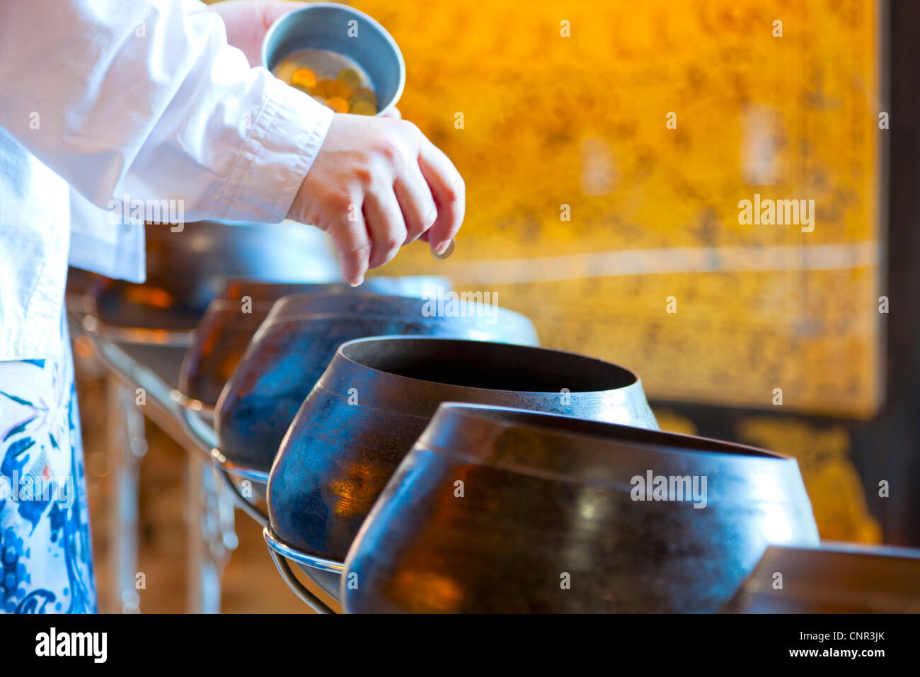 Money offerings hi-res stock photography and images - Alamy