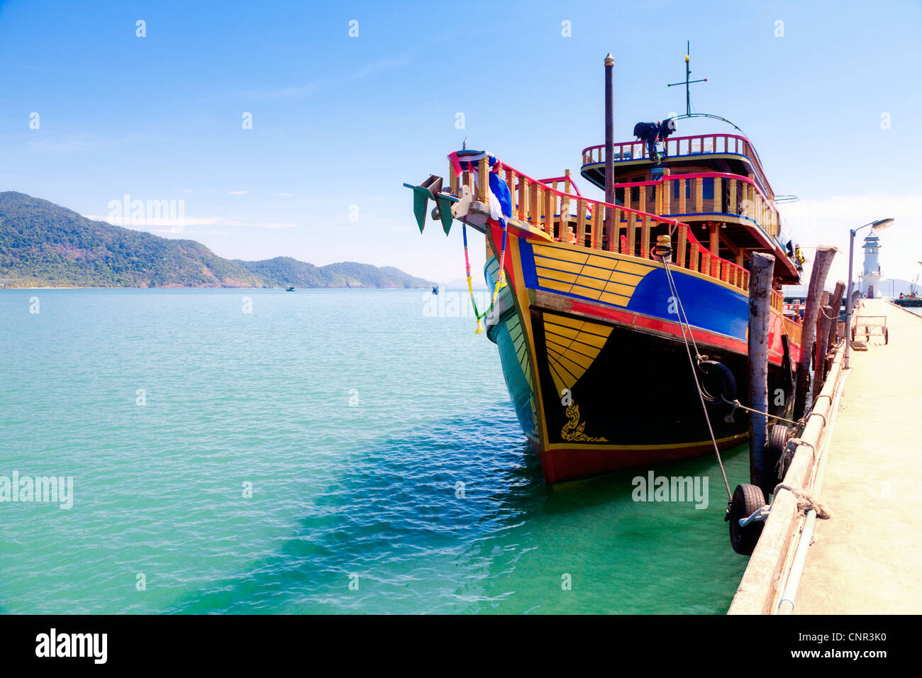 Thai tour boat Stock Photo - Alamy