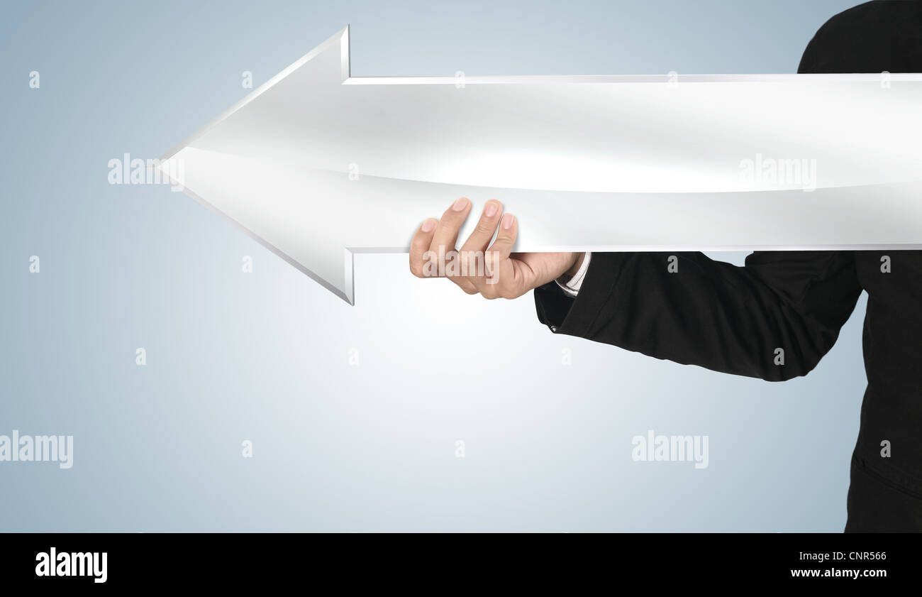 hands holding white arrow sign (path in side Stock Photo - Alamy