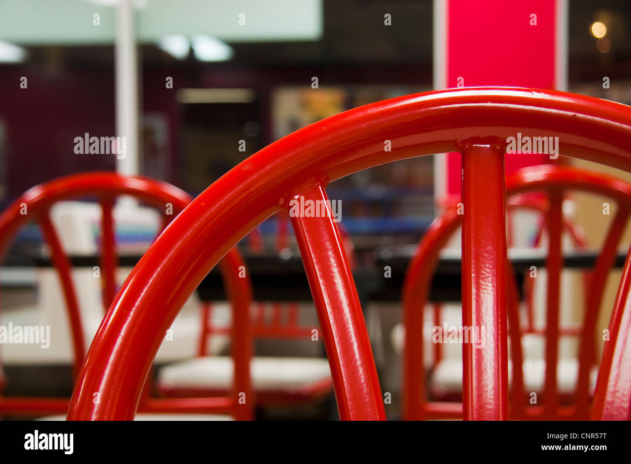 Arrangement of several red chairs in a Burger King Fast Food Restaurant ...