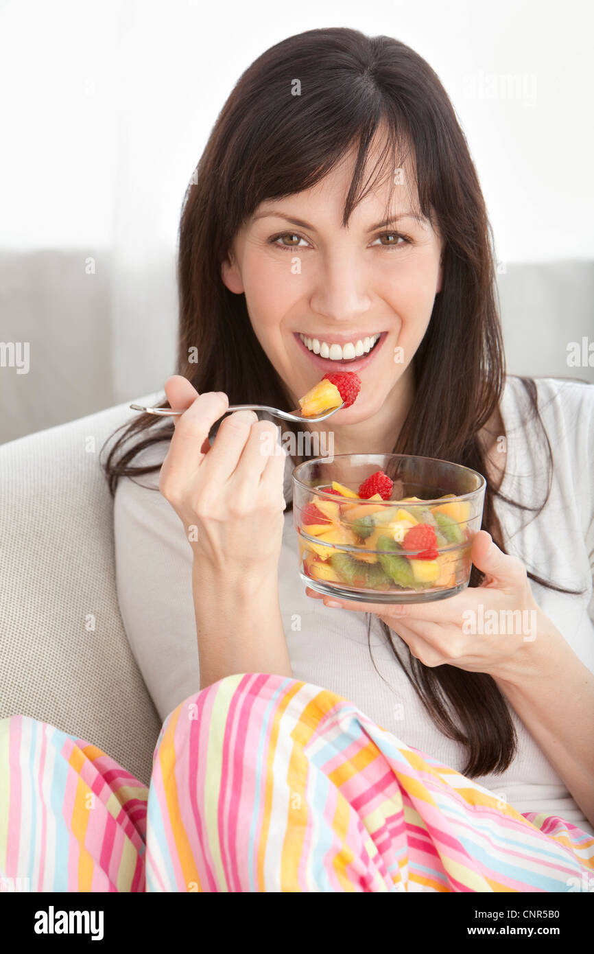 50 year old woman eating fruit hi-res stock photography and images - Alamy