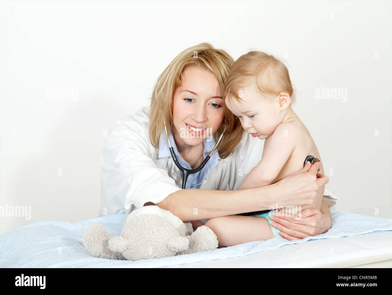 doctor with baby Stock Photo - Alamy
