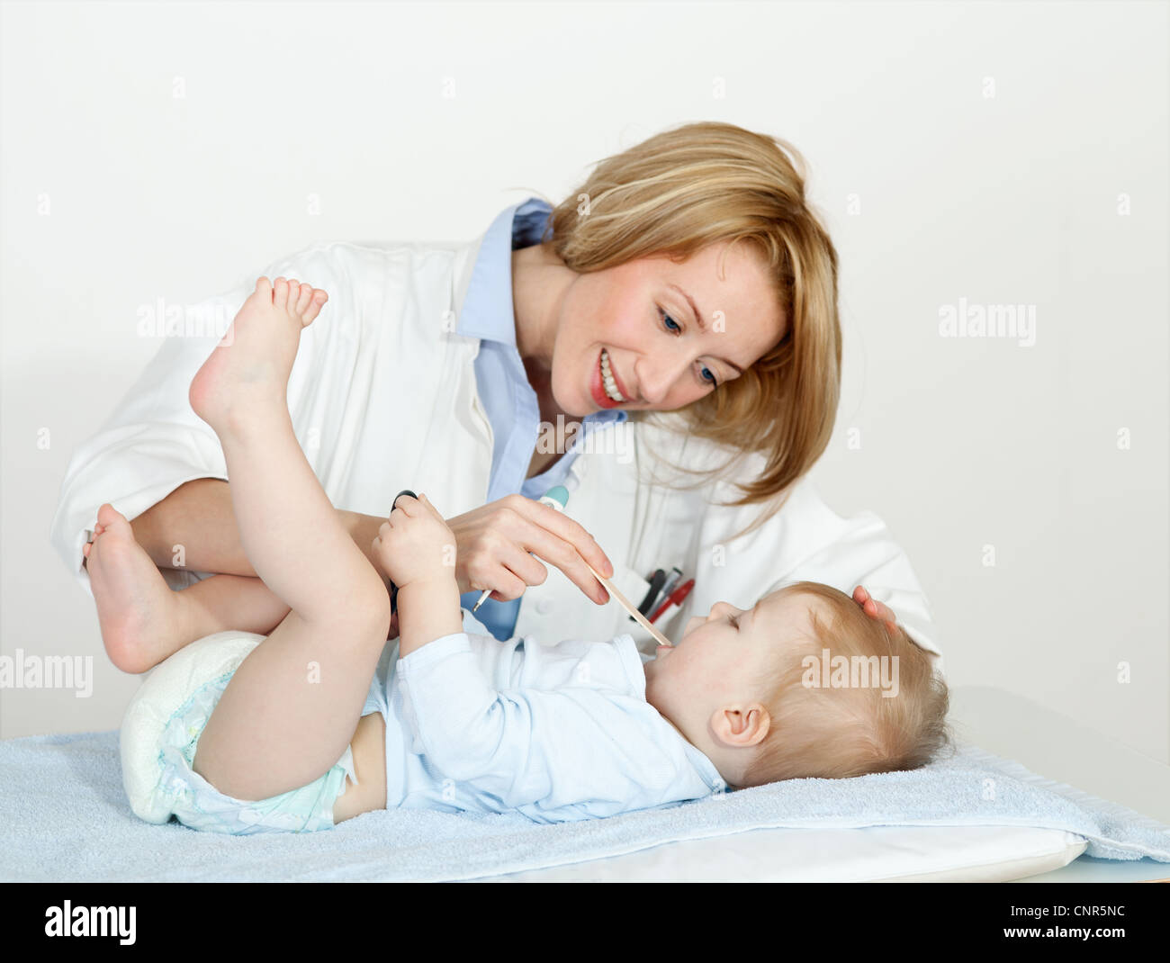 doctor with baby Stock Photo - Alamy