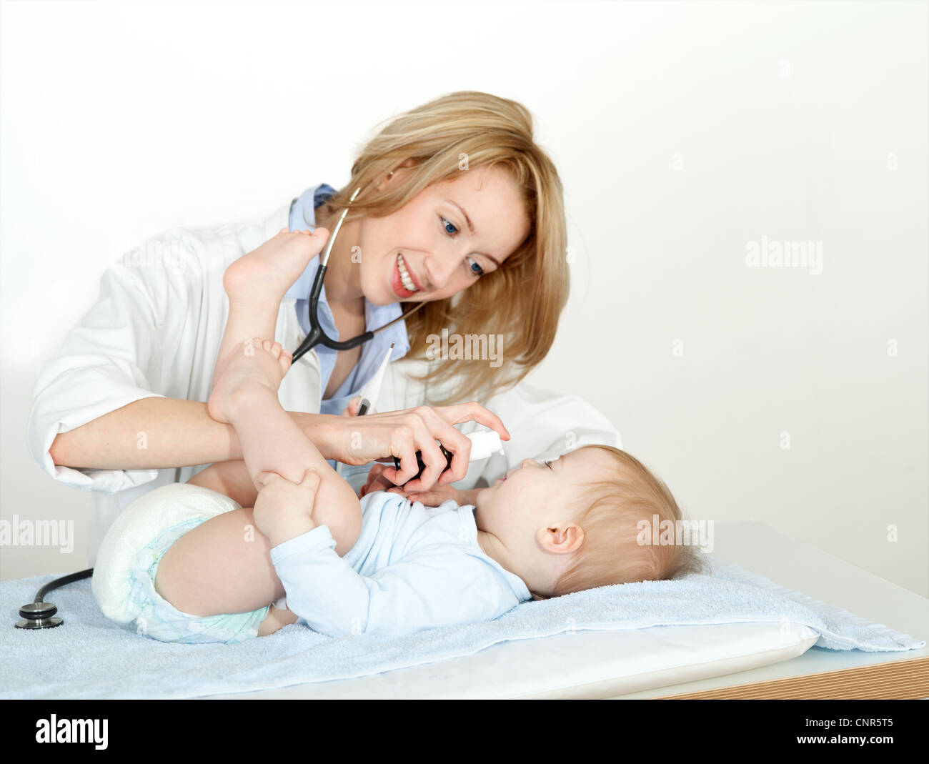 doctor with baby Stock Photo - Alamy