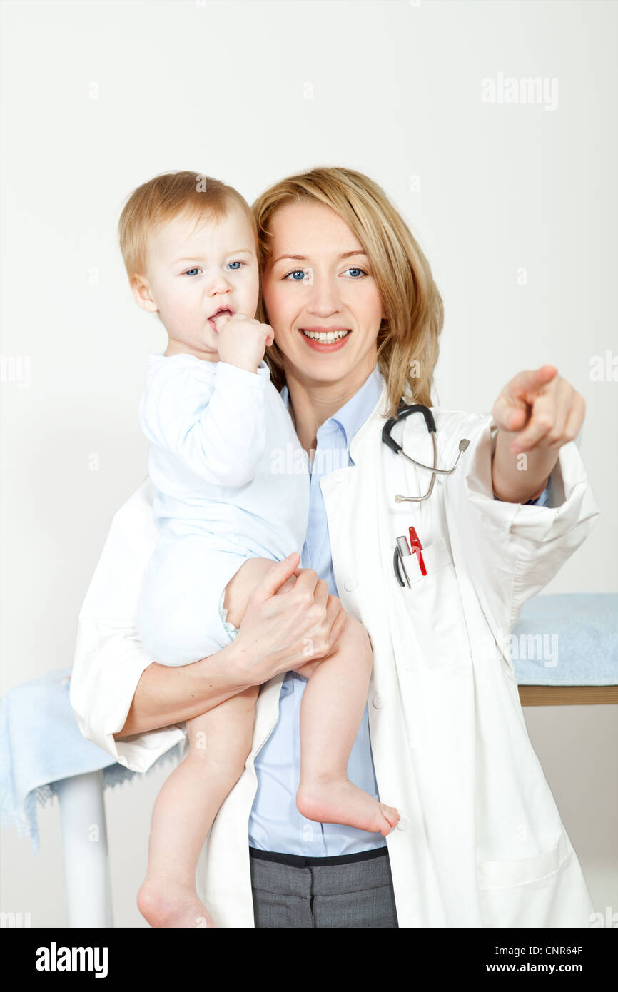 doctor with baby Stock Photo - Alamy
