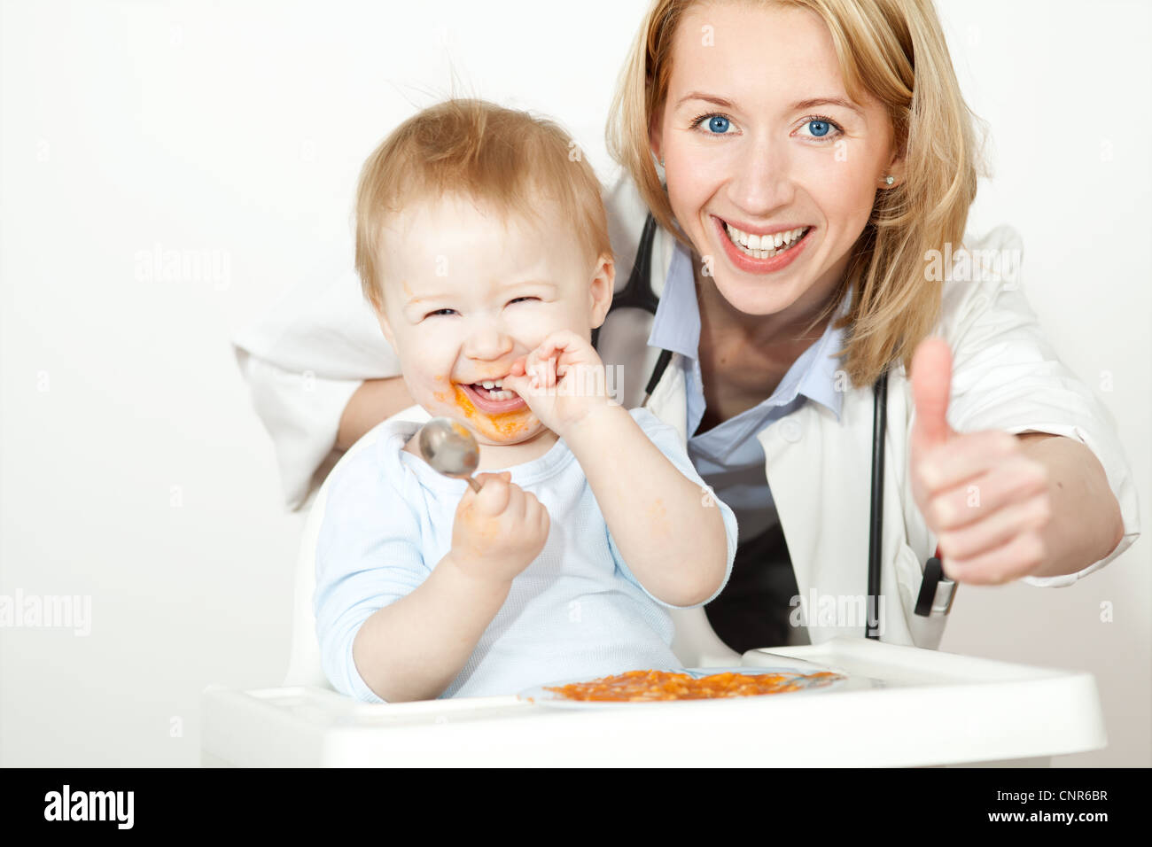 doctor with baby Stock Photo - Alamy
