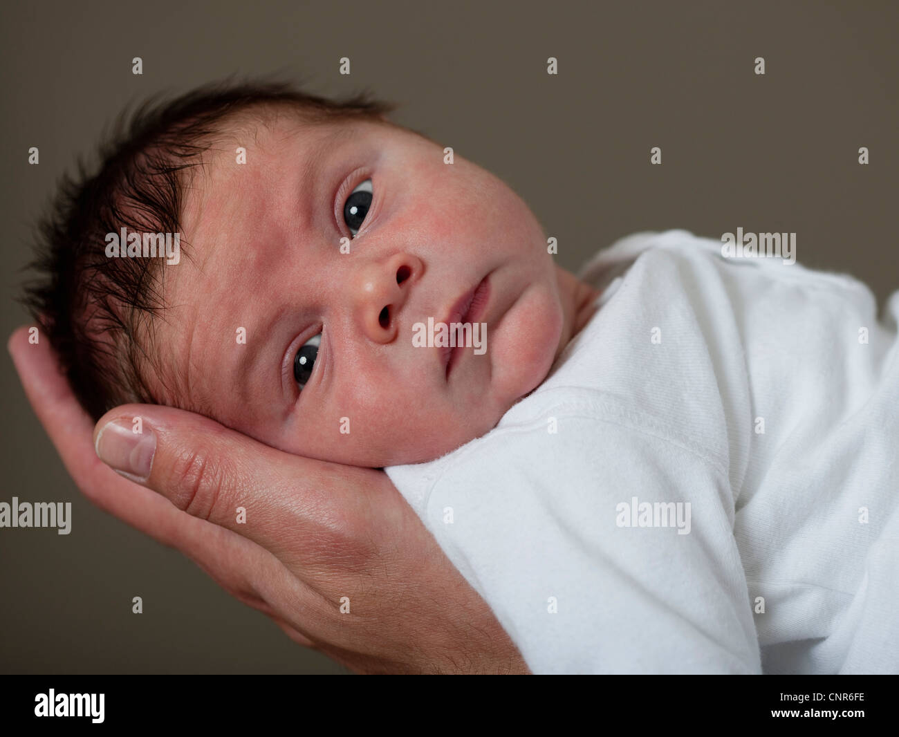 Close up of infant’s face Stock Photo - Alamy