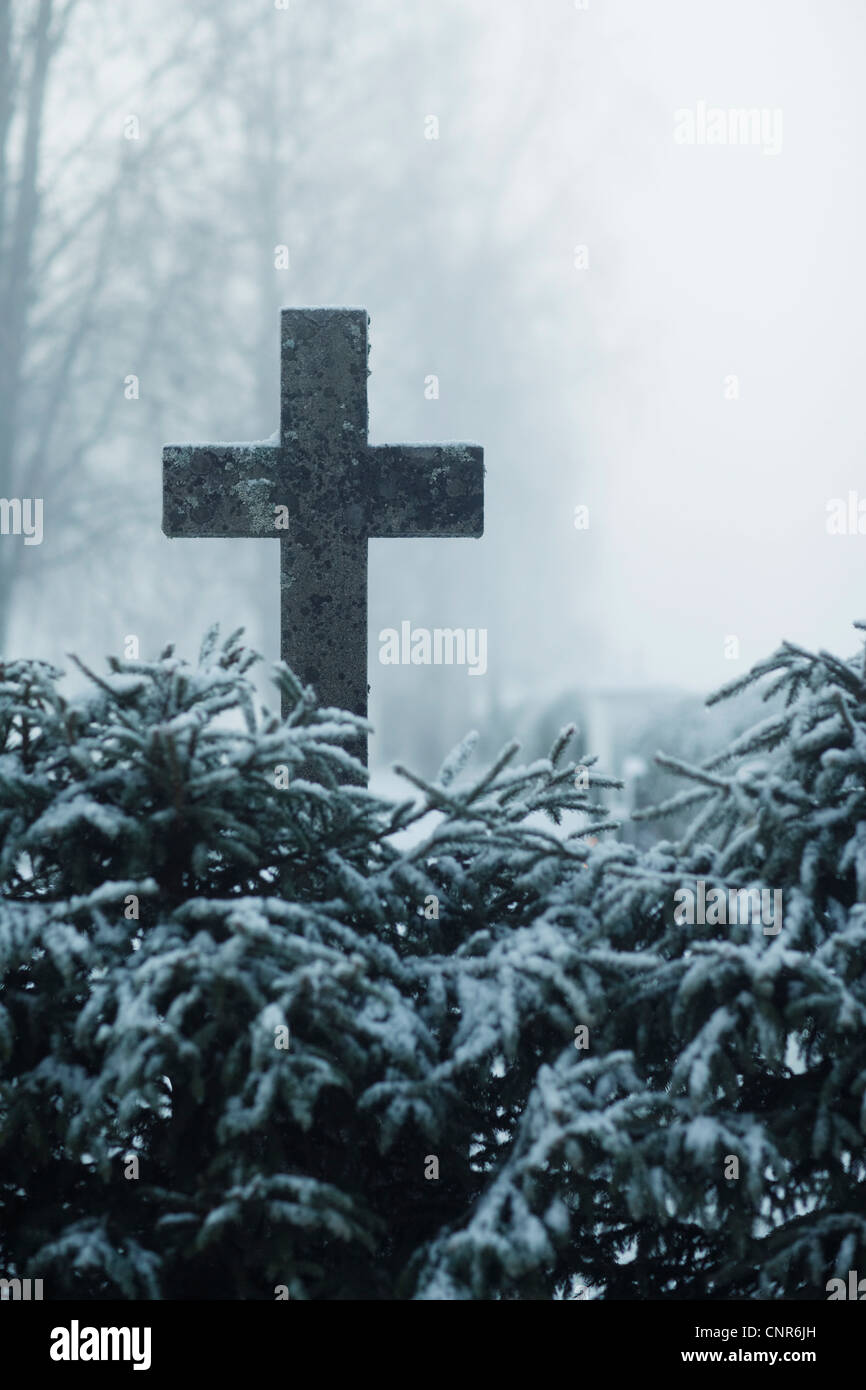 Cross in snowy field Stock Photo - Alamy